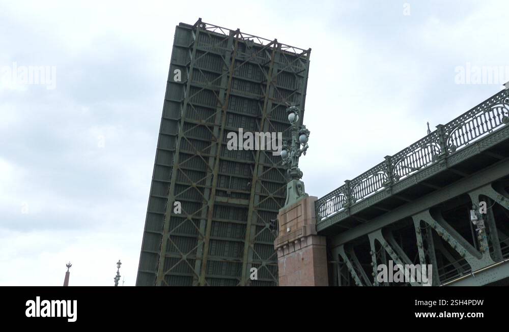 Raised span of movable bascule Trinity bridge in Saint Petersburg Stock ...