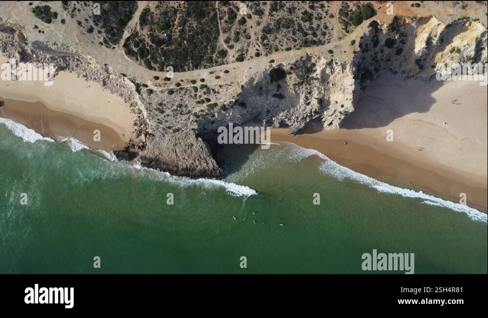 impressive mareta beach with cliffs in south portugal, drone shot from Stock Video Footage - Alamy