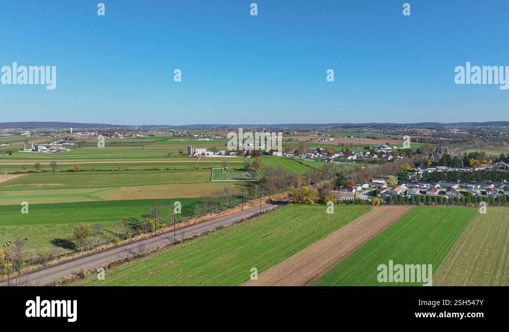 An Aerial View of An Amish Farm Water Tower and Countryside with a ...