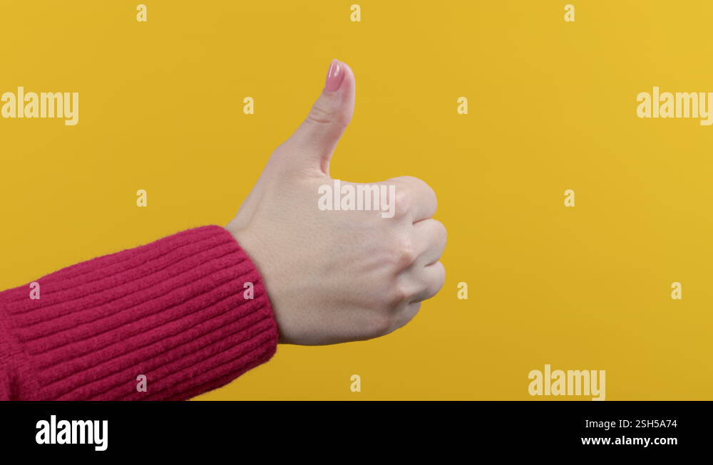 Woman makes hand sign like, thumb up gesture. Correct perfect choice ...