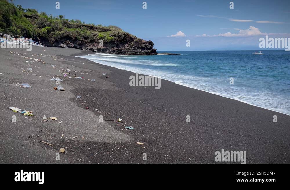 Foamy Waves Washing Ashore At The Beach With Toxic Waste Littered On ...