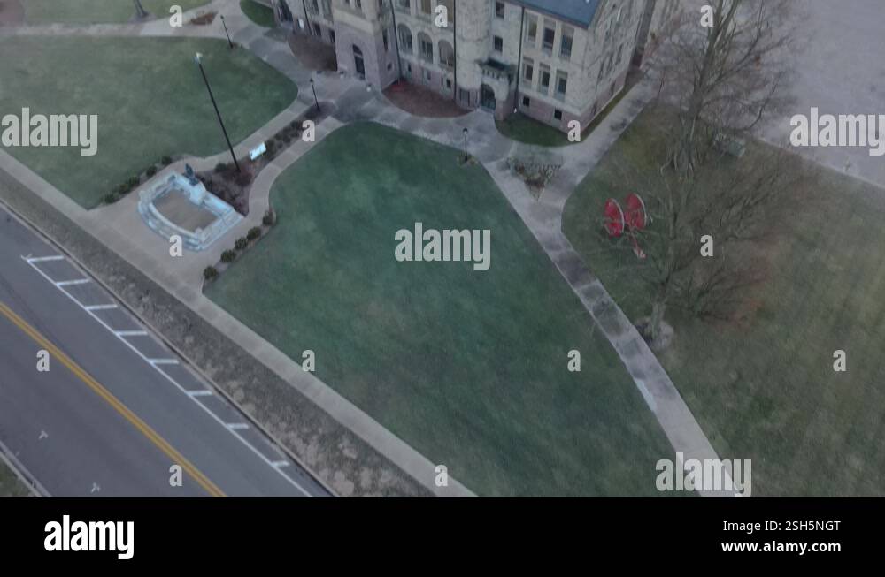 Tilting from the bird's eye view of the grounds to a view of Hackley ...