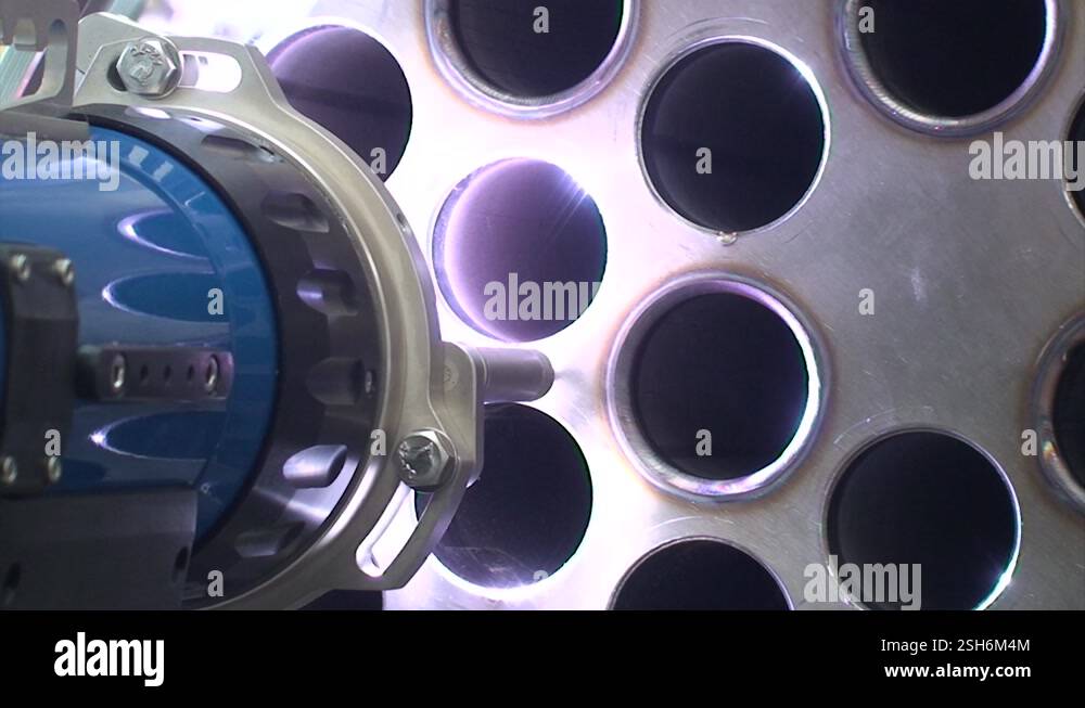 Welding shell and tube in tube heat exchanger. Welding head equipment ...