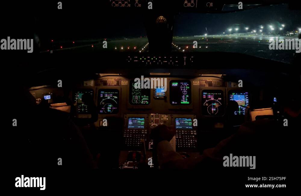 Jet cockpit view in a real flight during night landing at Valencia’s ...