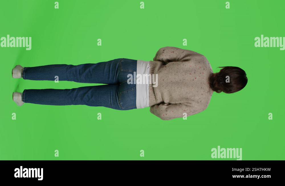 Vertical video: Back view of angry model acting frustrated on full body ...