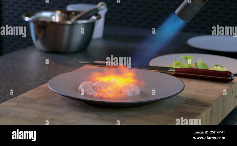 Seafood on an open fire. We fry the king crab with a gas burner Stock ...