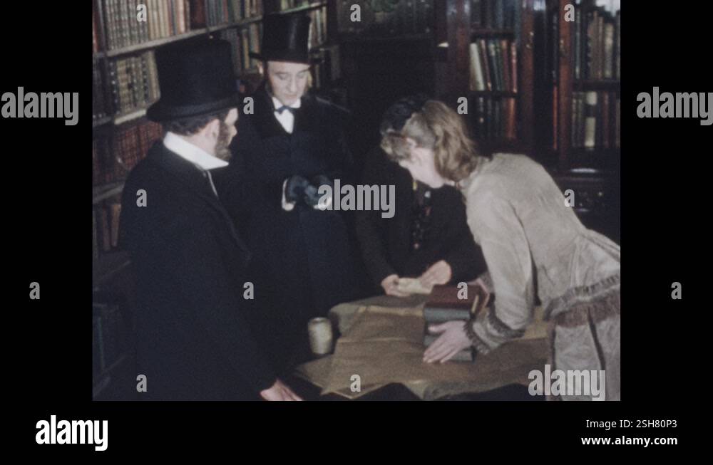 1960s: Library, people work, woman wraps stack of books in brown paper ...