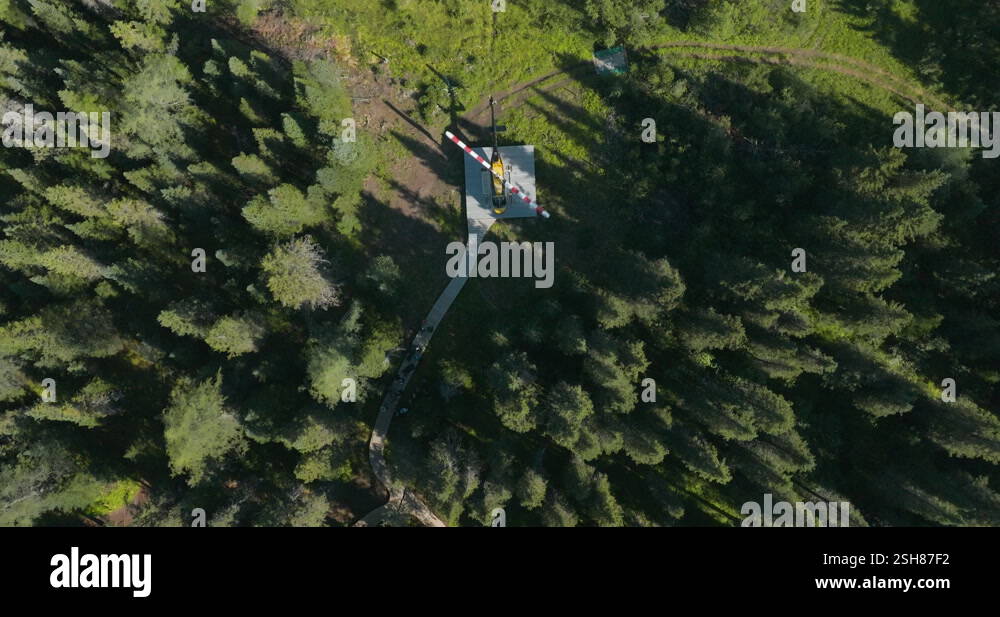 Gorgeous overhead look at a helicopter spinning its blade in slow ...