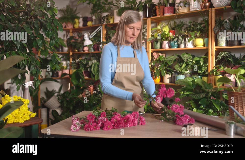 Beautiful woman florist making bouquet Stock Videos & Footage - HD and ...