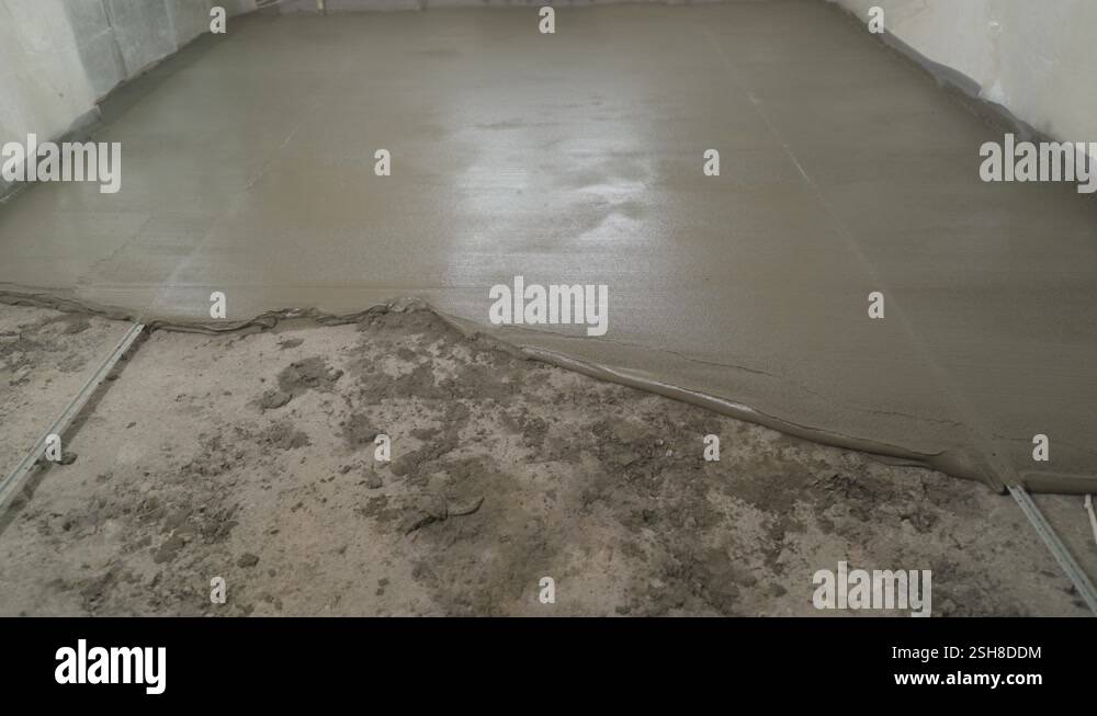 Laying paving slabs. Pointing a patio with dry grouting cement grouting ...