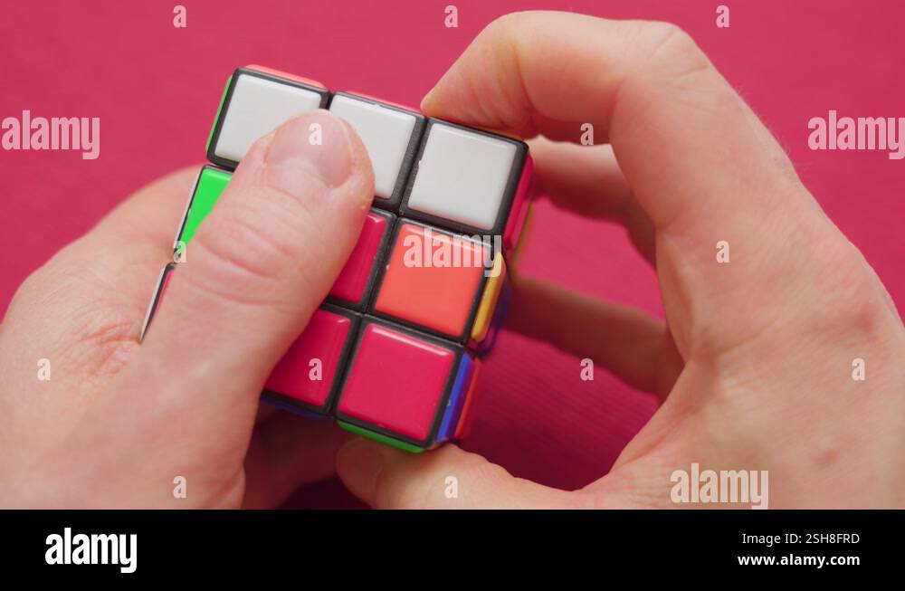 Man trying to solve a Rubik's Cube. Close up Stock Video Footage - Alamy
