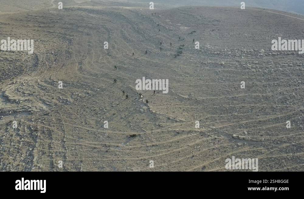 Orbit shot of IDF Soldiers during routine physical training on desert ...