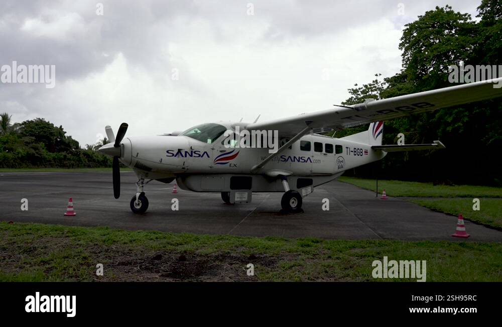 Cessna 208B Grand Caravan EX from Sansa Airlines parked at runway ...