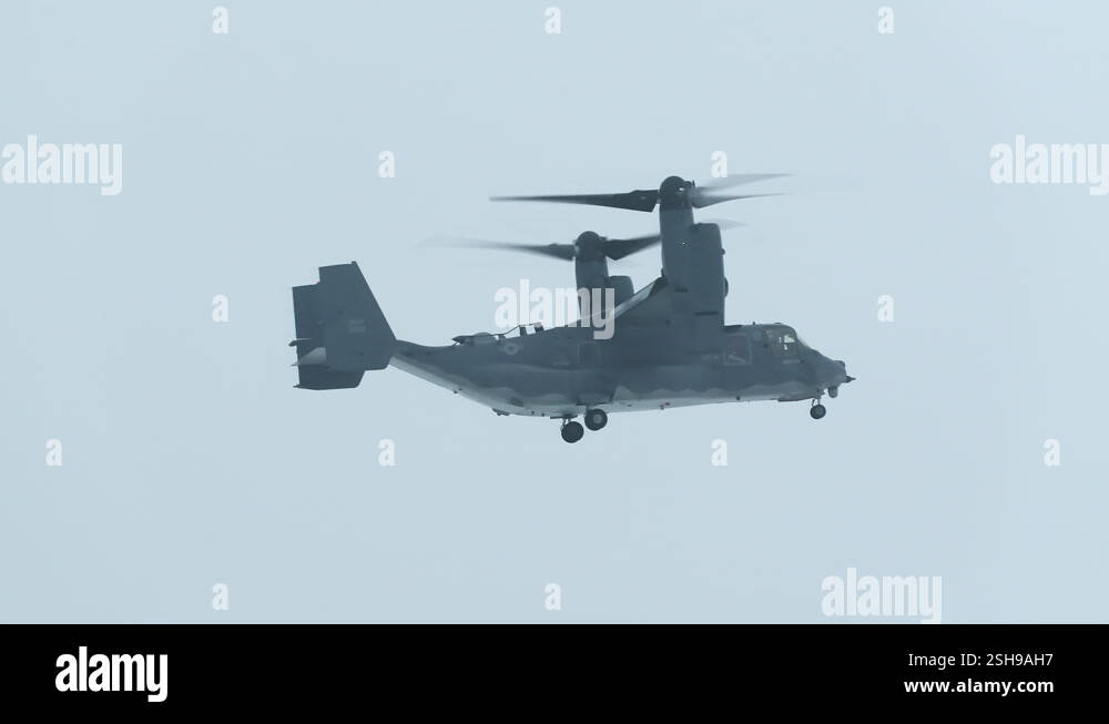 bell boeing v22 osprey military helicopter usaf passing by Stock Video ...