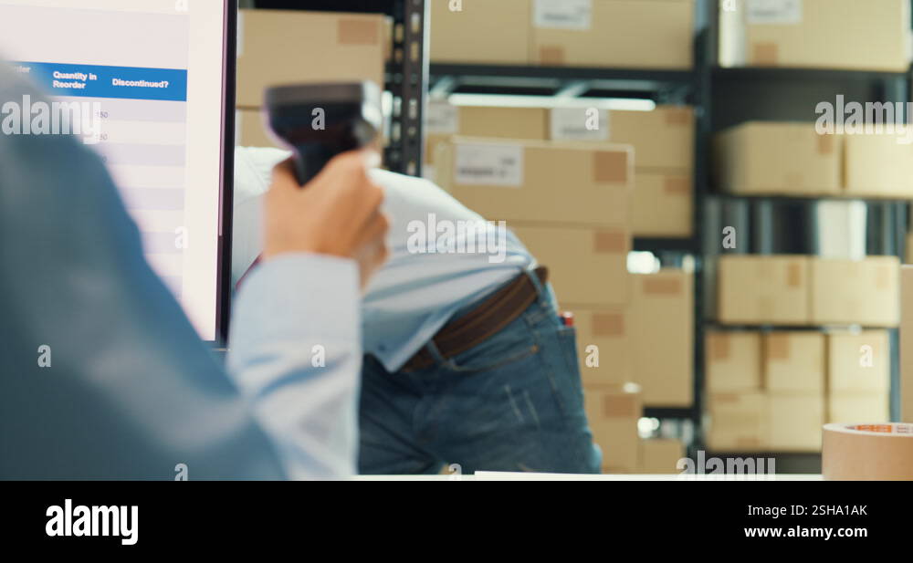 Asian business man hold box and girl use barcode machine scanner stock ...