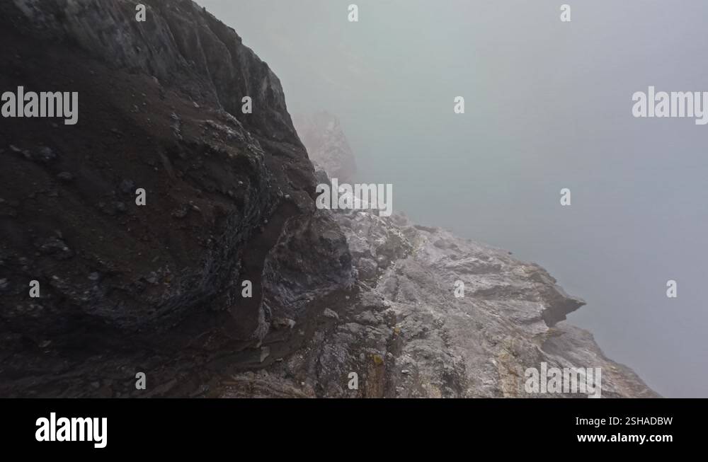 Man running in respiratory mask tropical island volcano dive to crater ...