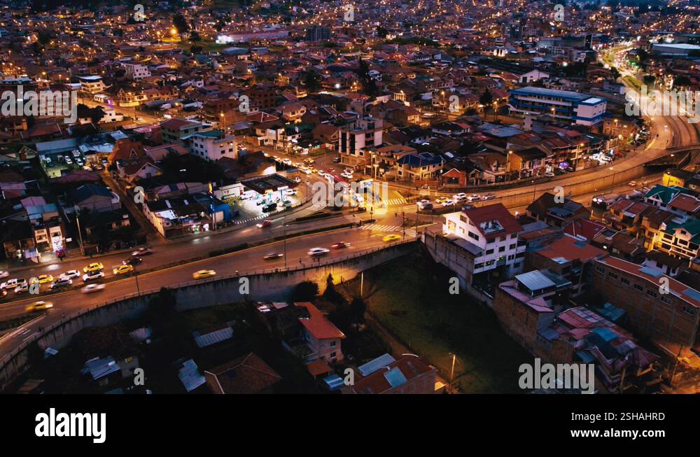 A hyperlapse shot seen from a plane in orbit of a drone in a city dusk ...