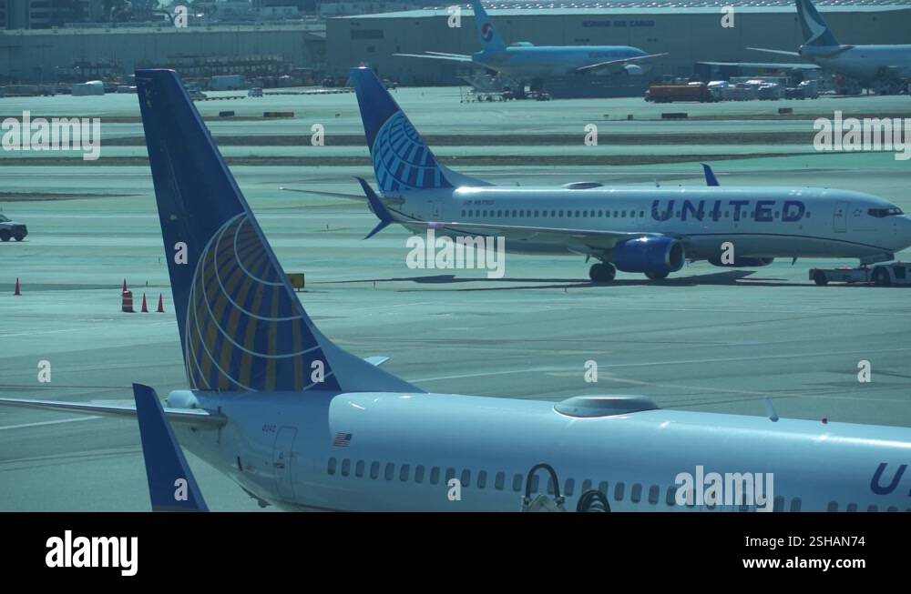 LAX Los Angeles Airport Runway with United Airlines Airplanes Stock ...
