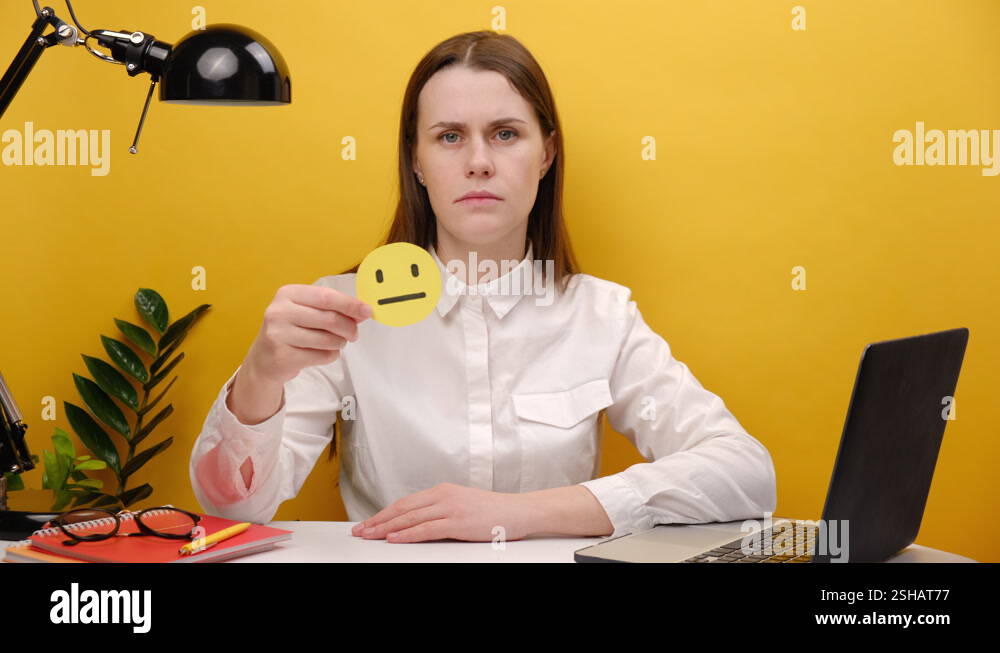 Business woman sit work at office desk pc laptop holding sad face, bad ...