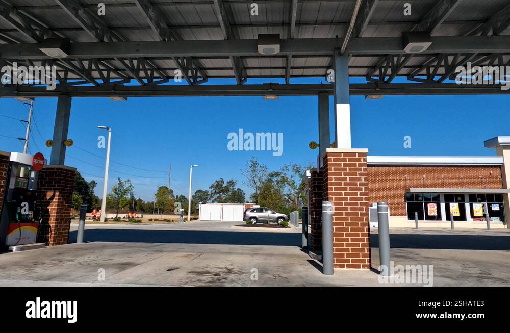 New Sprint gas station building pan of pumps and building Stock Video ...