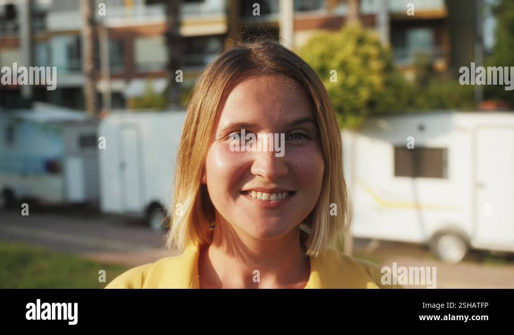 Beautiful woman owner motor home, camping van driver smiling, tourist ...