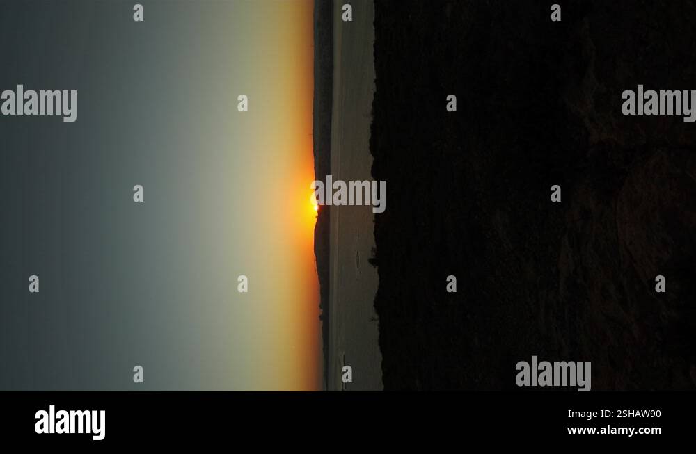 Vertical Real time sunrise at Selmun Bay in Malta Stock Video Footage ...