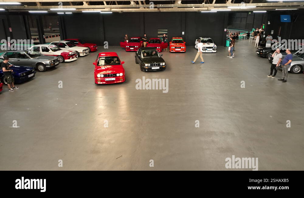 Classic custom BMW e30 cars parking in club warehouse car show, Slow ...
