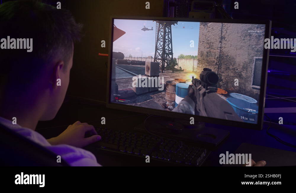 Gamer playing the modern military warfare first-person shooter ...