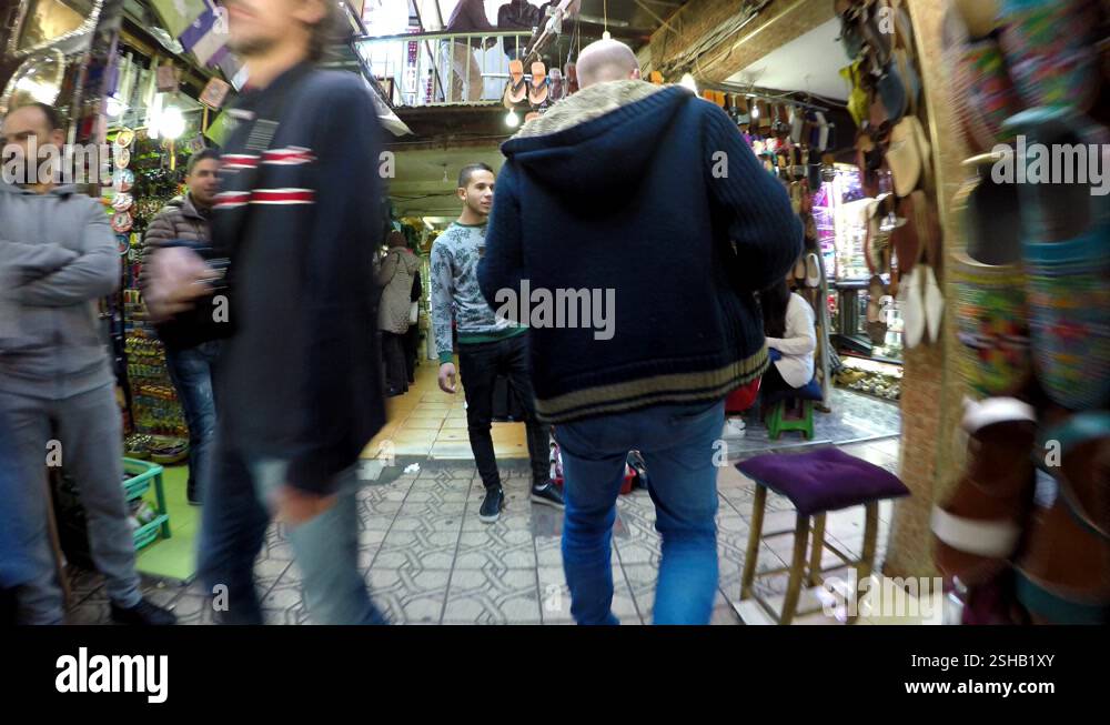 Marrakech, Marocco: The busy souk downtown with salesmen and tourists ...