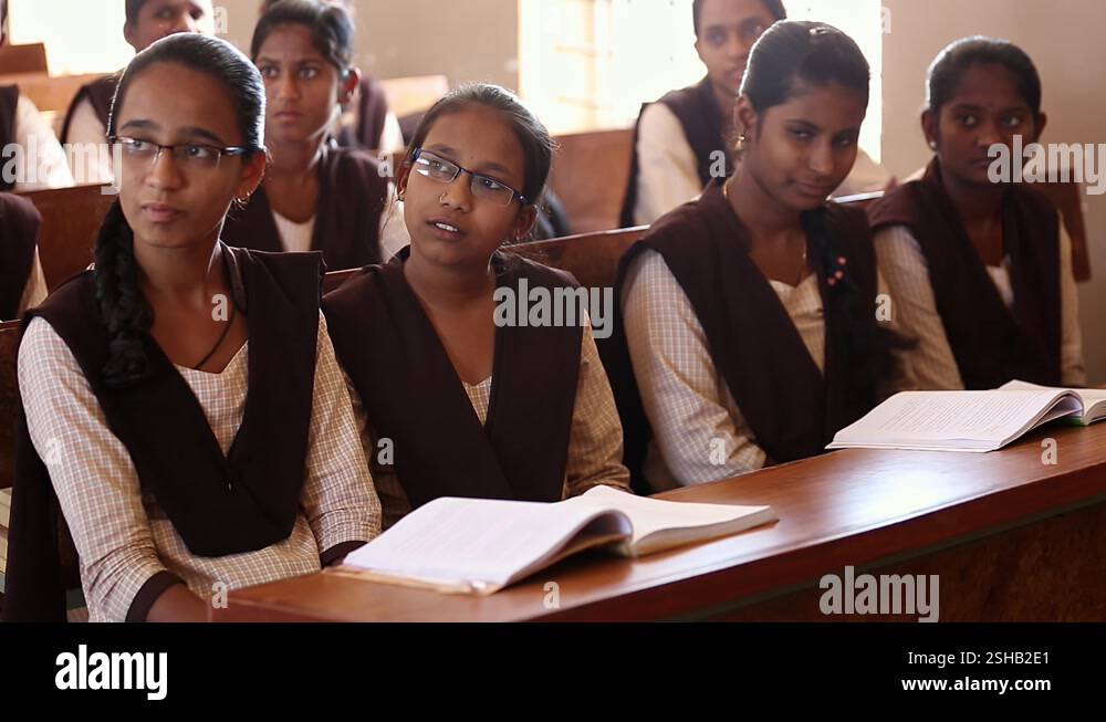 Closeup of indian female students listening to the lecture in the ...