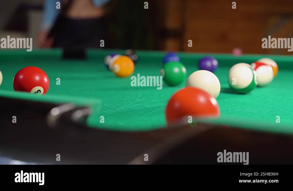 ball hits the middle pocket in billiards Stock Video Footage - Alamy