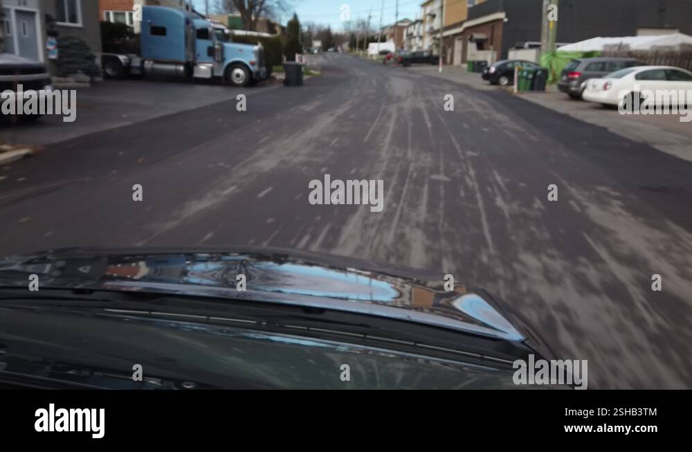 Grey SUV Driving on Suburban Streets Stock Video Footage - Alamy