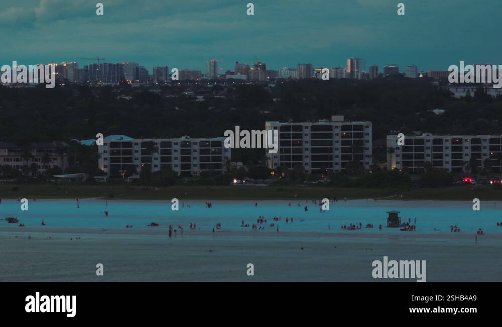 Aerial view of Siesta Key beach with white sands and distant downtown ...