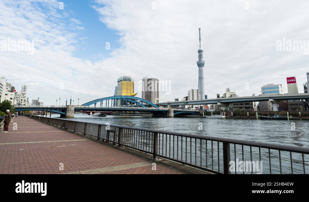 Hyperlapse timelapse of people walk at Sumida river, Tokyo Skytree view ...