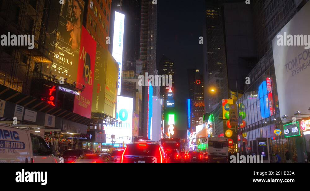 Night Scene Of Traffic Jam And City Lights At The Times Square In ...