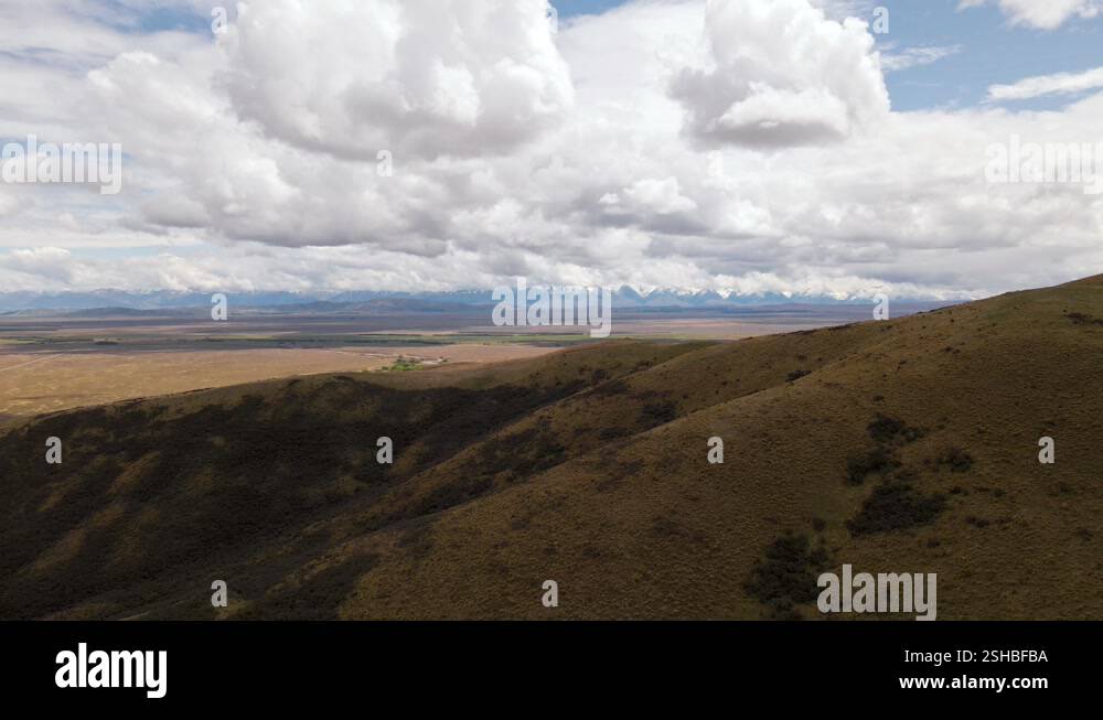 Aerial view of the dry hills of Canterbury, New Zealand with majestic ...