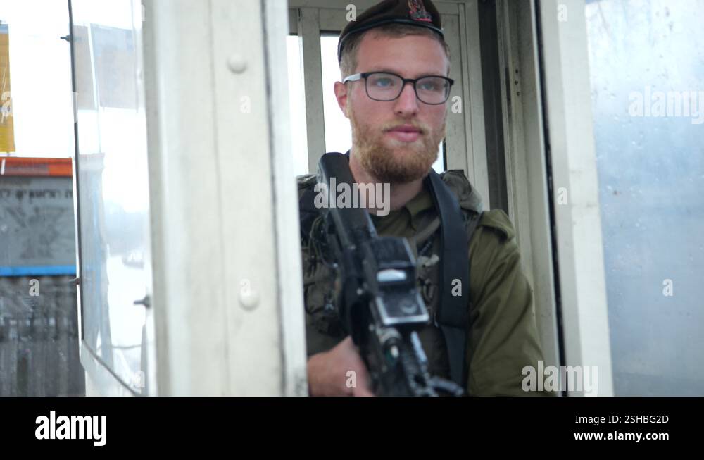IDF Israel Soldier in Military Uniform With Rifle on Duty in Sentry Box ...
