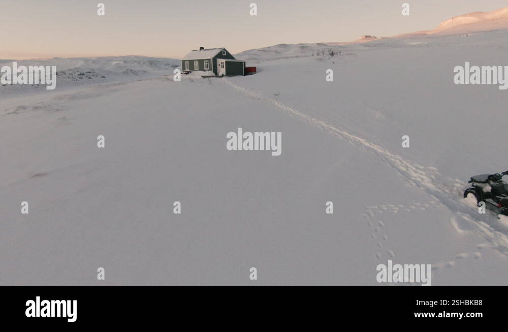 Frozen house in middle of snowy icelandic landscape, dolly forward ...