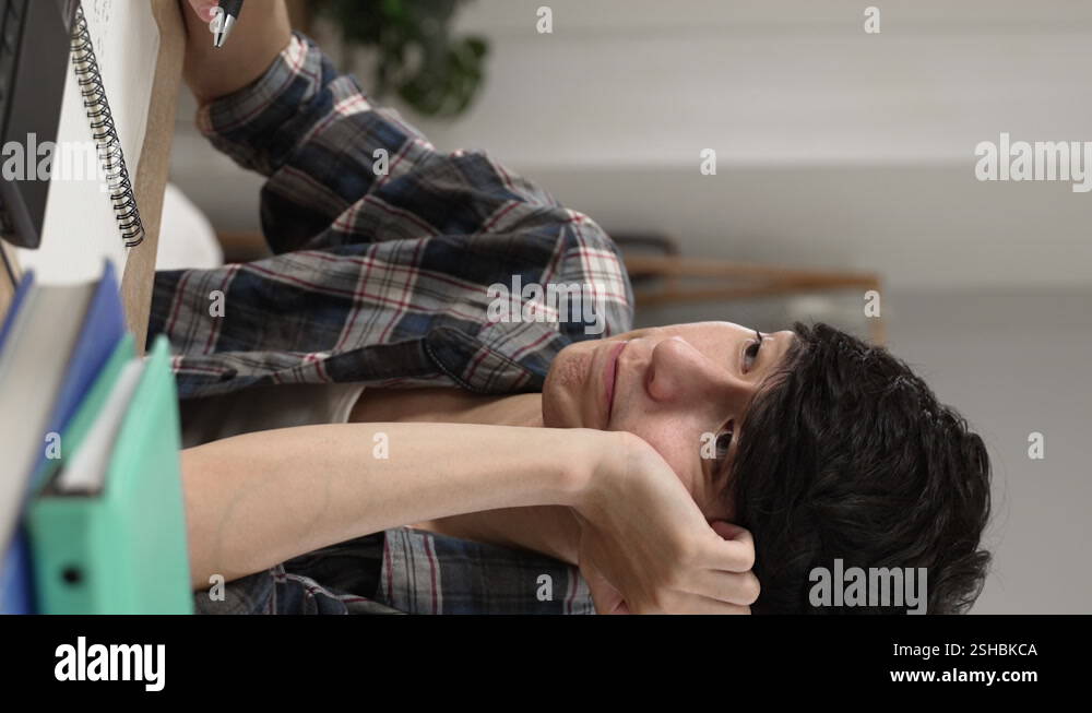 bored asian male adult student Stock Video Footage - Alamy