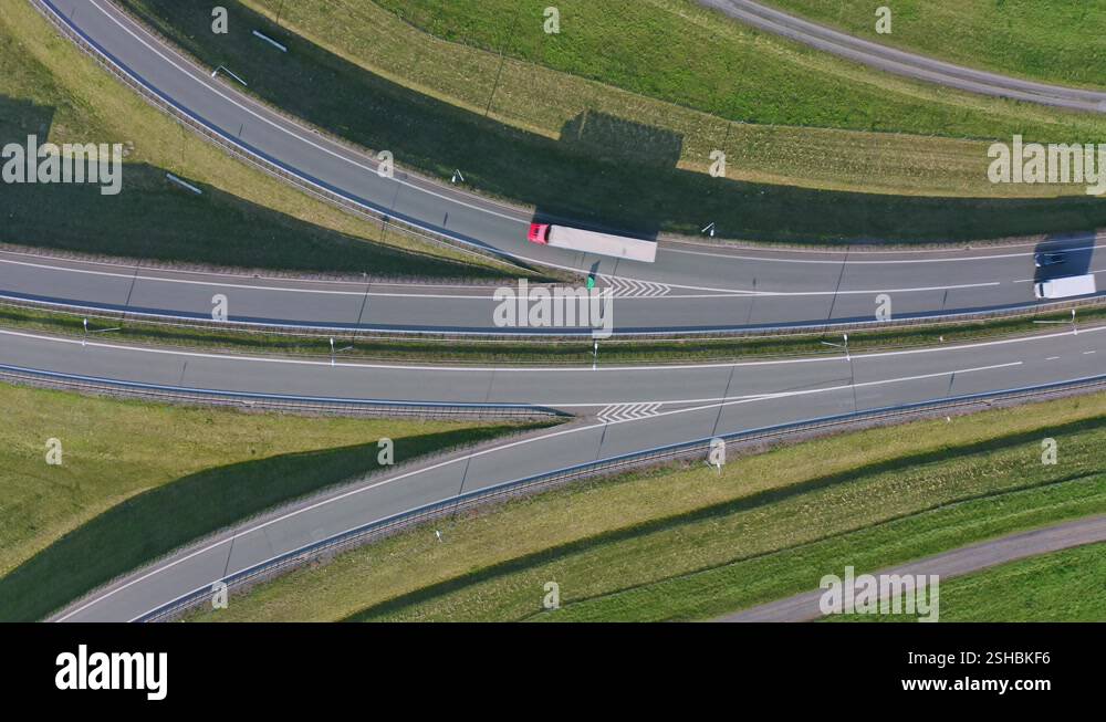 Static overhead aerial of traffic on highway ramps in sunlight Stock ...