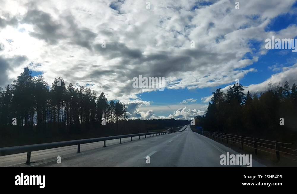 Driving on a Swedish highway under beautiful cloudscape Stock Video ...