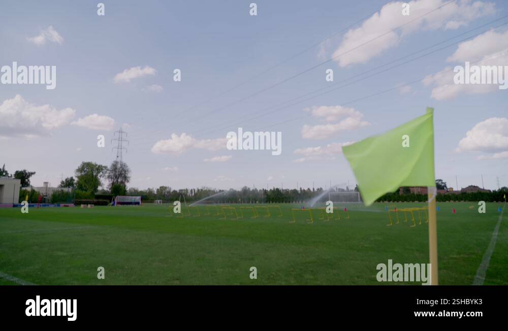 Soft tilt from sky down to football practise grounds Stock Video ...