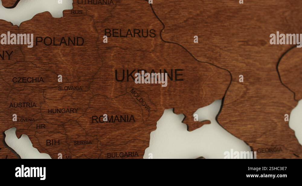 Wooden world map wall decoration in modern simplistic room with white ...