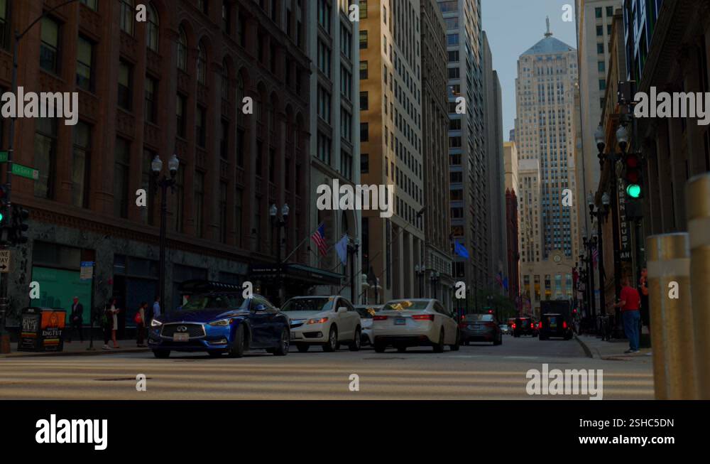 Cars travel through an intersection in downtown Chicago Stock Video ...