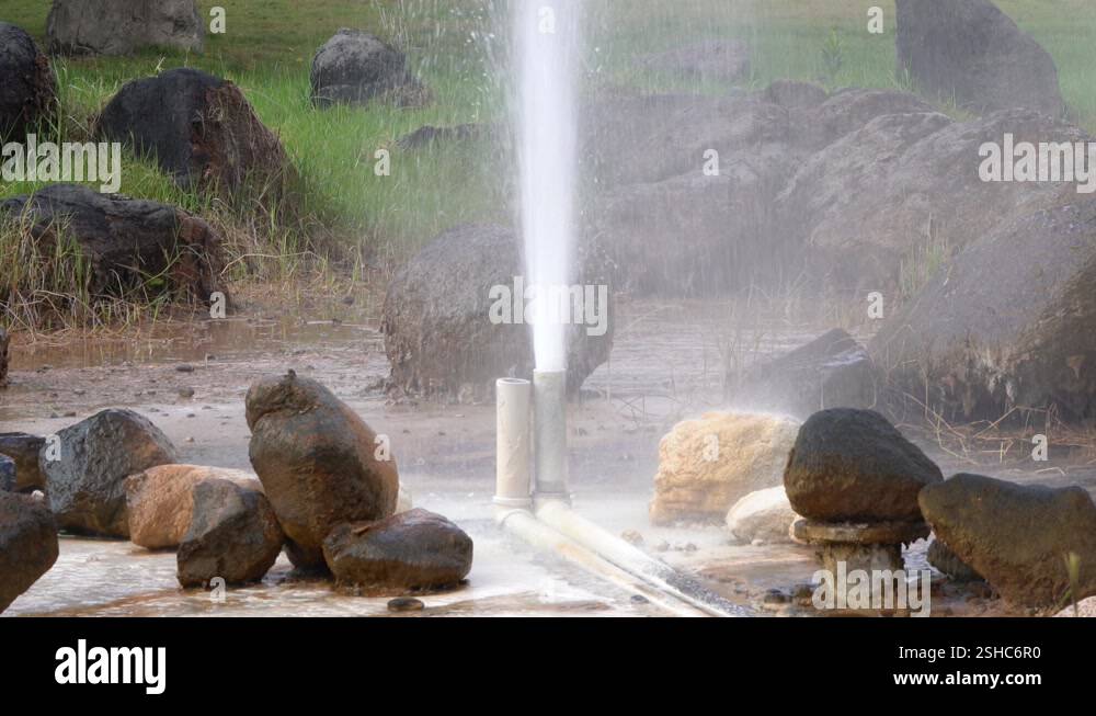 Steamy Sulfuric High-Pressure Water Coming Out Of A Pipe At a Hot ...