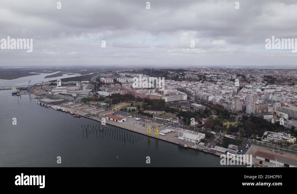 Aerial Flying Over River Odiel With View Of Logistics Terminal Port In ...