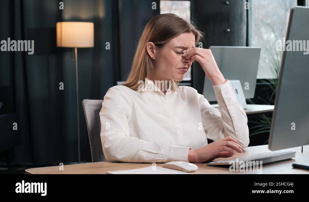 Stressed female worker suffering from muscles tension, girl having ...