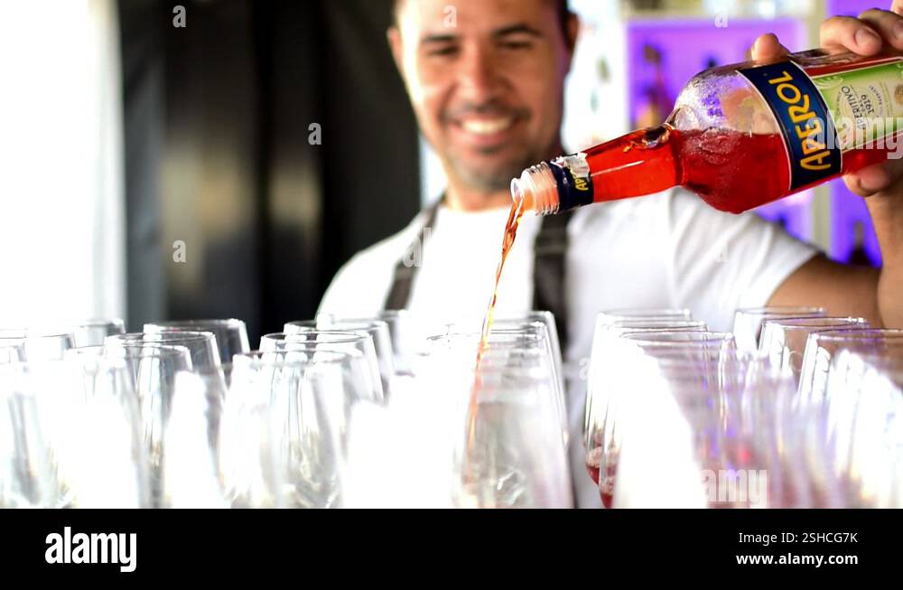 Barcelona, Spain, October 27, 2022: Barman pouring Aperol, an italian ...