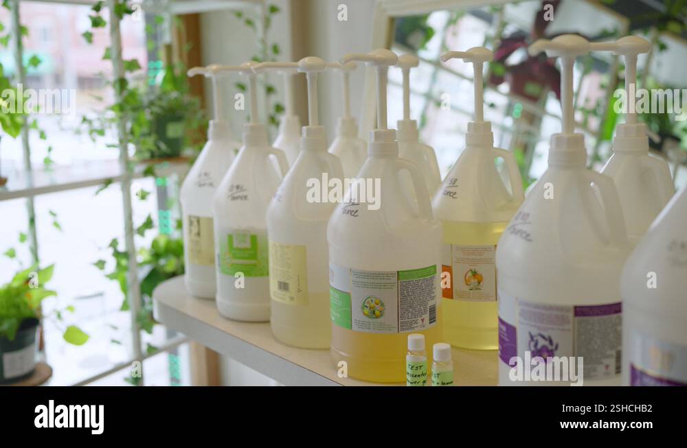 Soap refill bottles at an eco-friendly store. Liquid soap refill ...