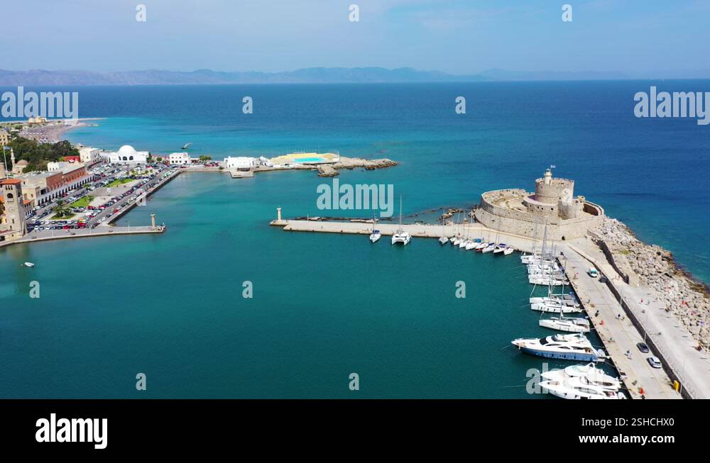 Mandraki port with deers statue, where The Colossus was standing and ...